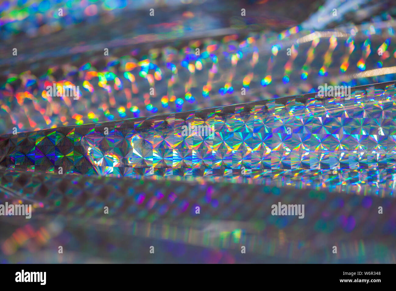 colorful patterns formed by light on prismatic paper colorful abstarct ...