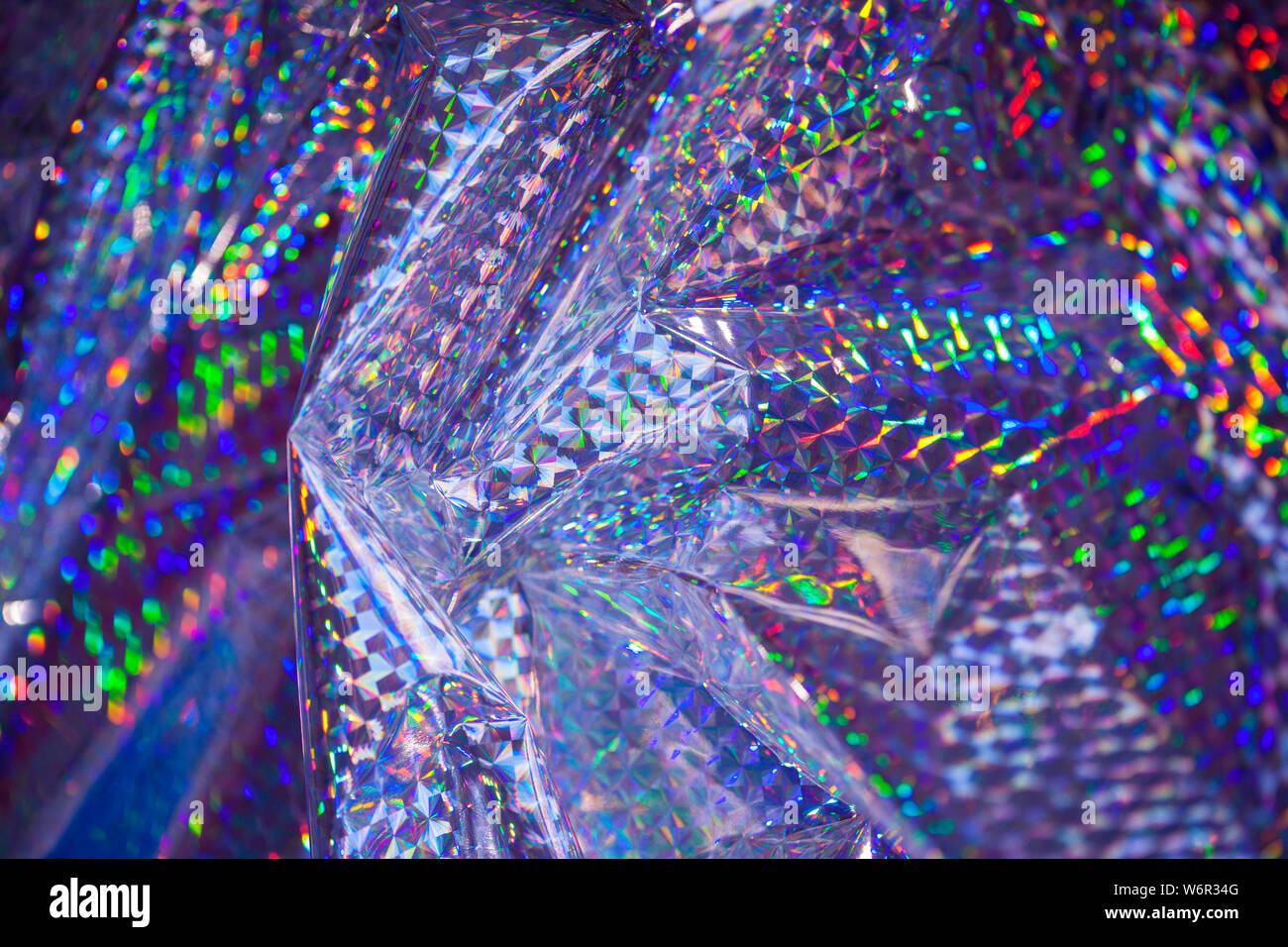 colorful patterns formed by light on prismatic paper colorful abstarct ...