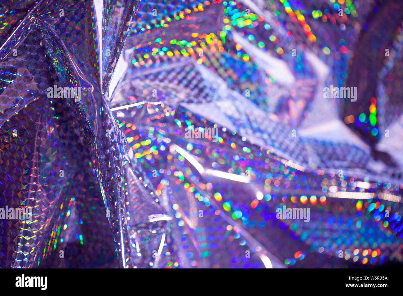 colorful patterns formed by light on prismatic paper colorful abstarct ...