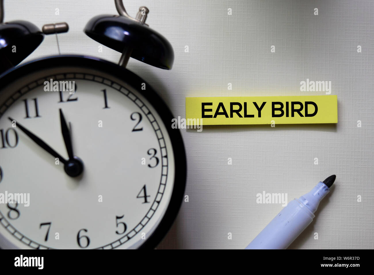 Early Bird text on sticky notes isolated on office desk Stock Photo - Alamy