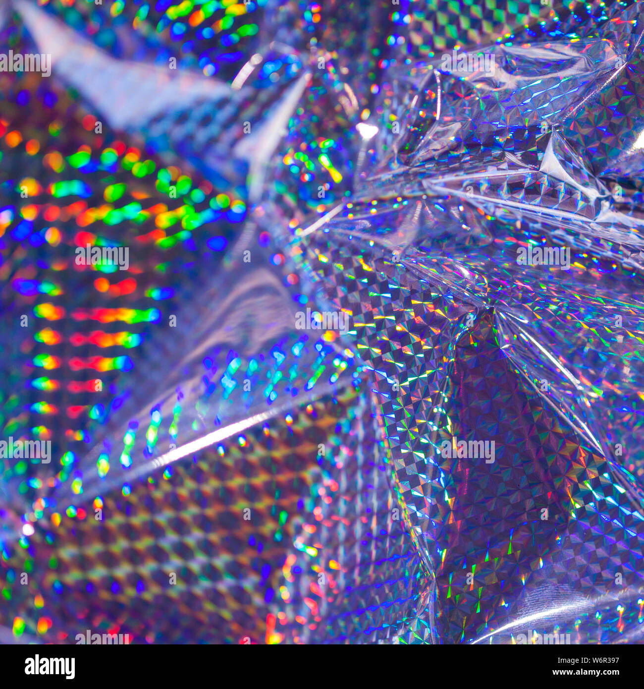 colorful patterns formed by light on prismatic paper colorful abstarct ...