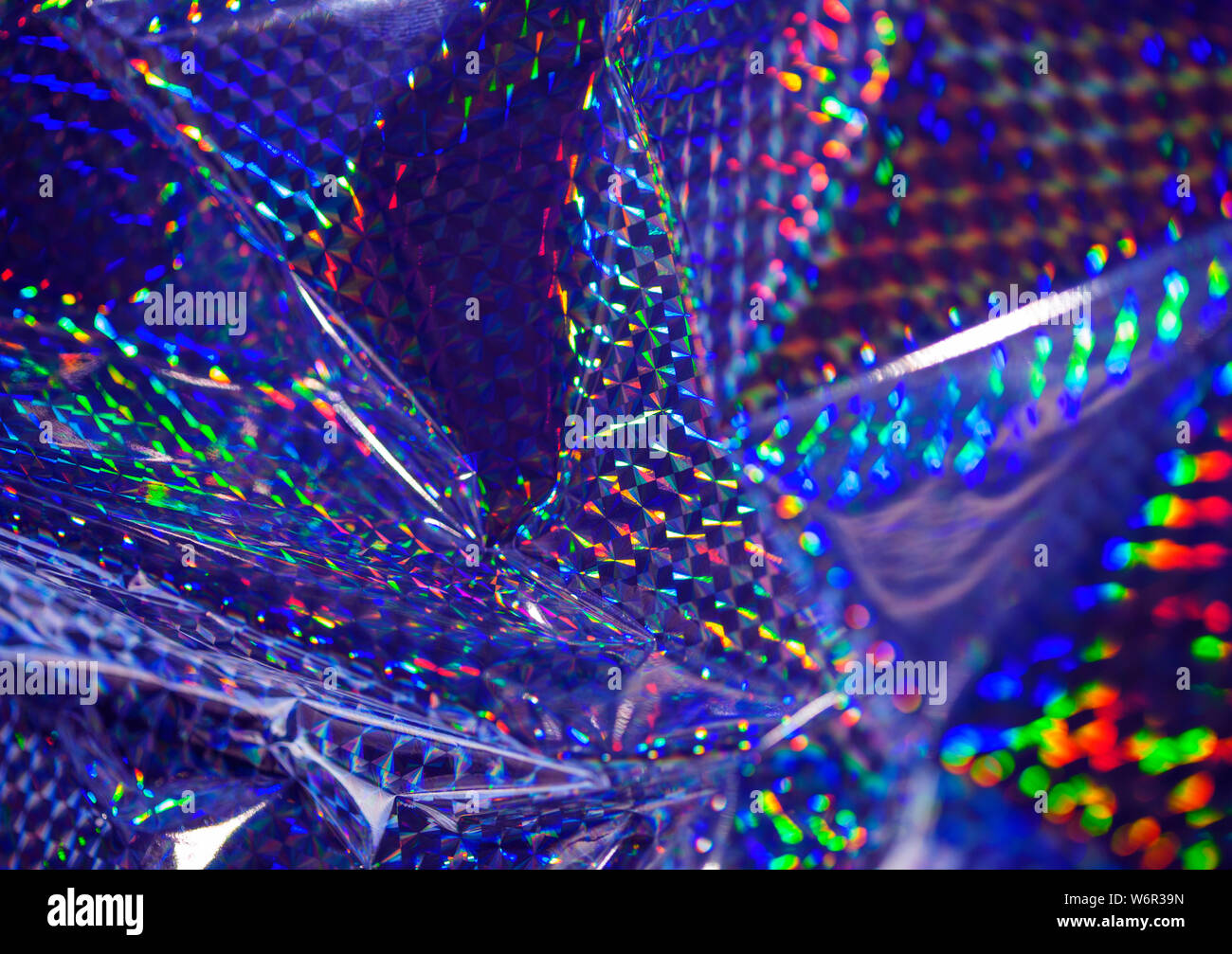 colorful patterns formed by light on prismatic paper colorful abstarct ...