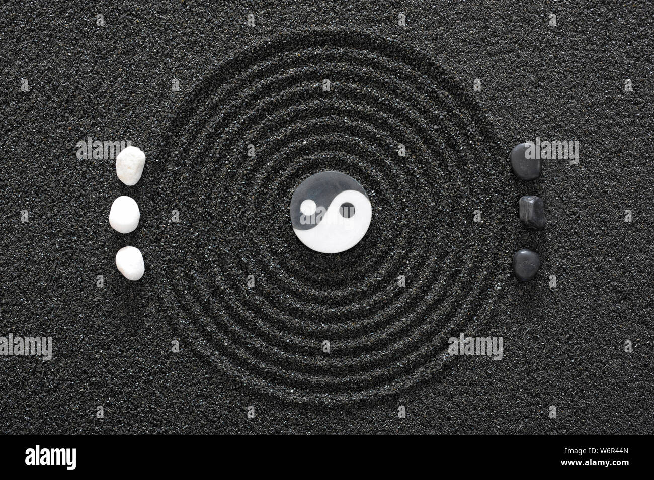 Japanese ZEN garden in black sand Stock Photo - Alamy