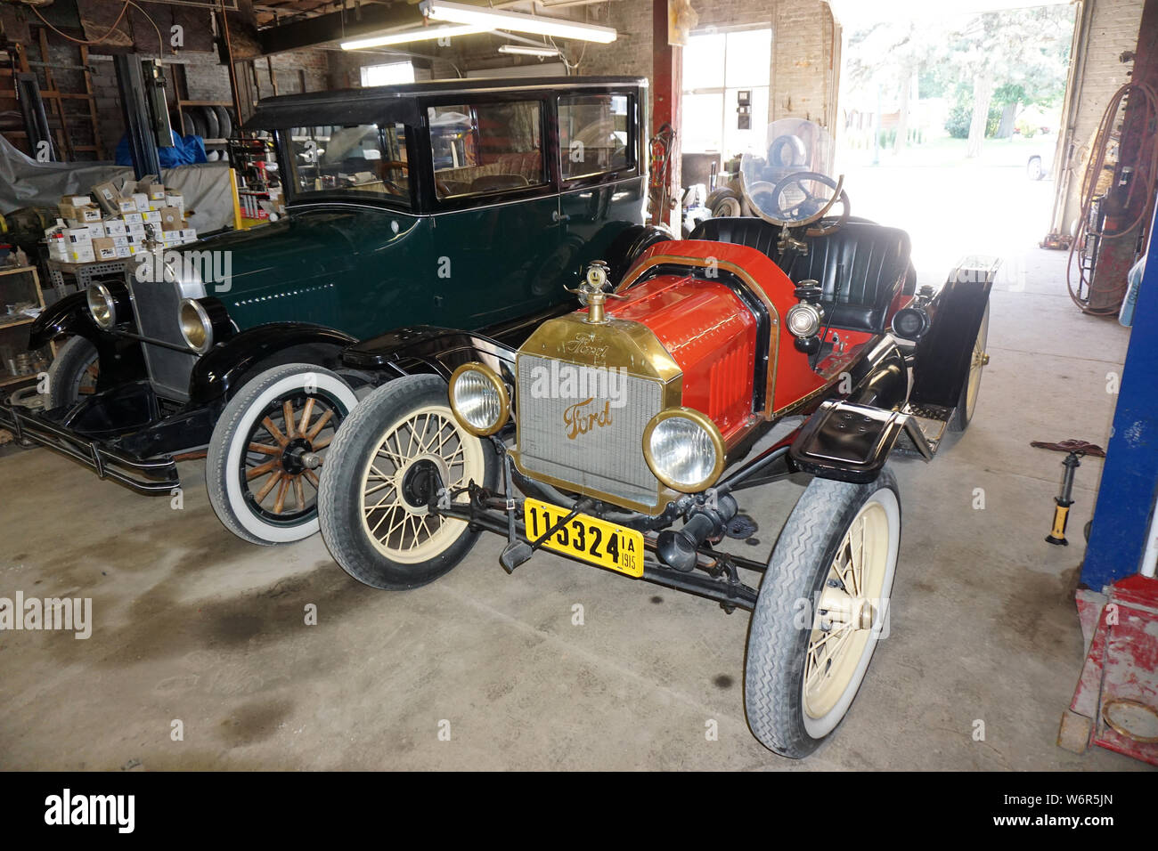 Antique cars in an old building Stock Photo - Alamy