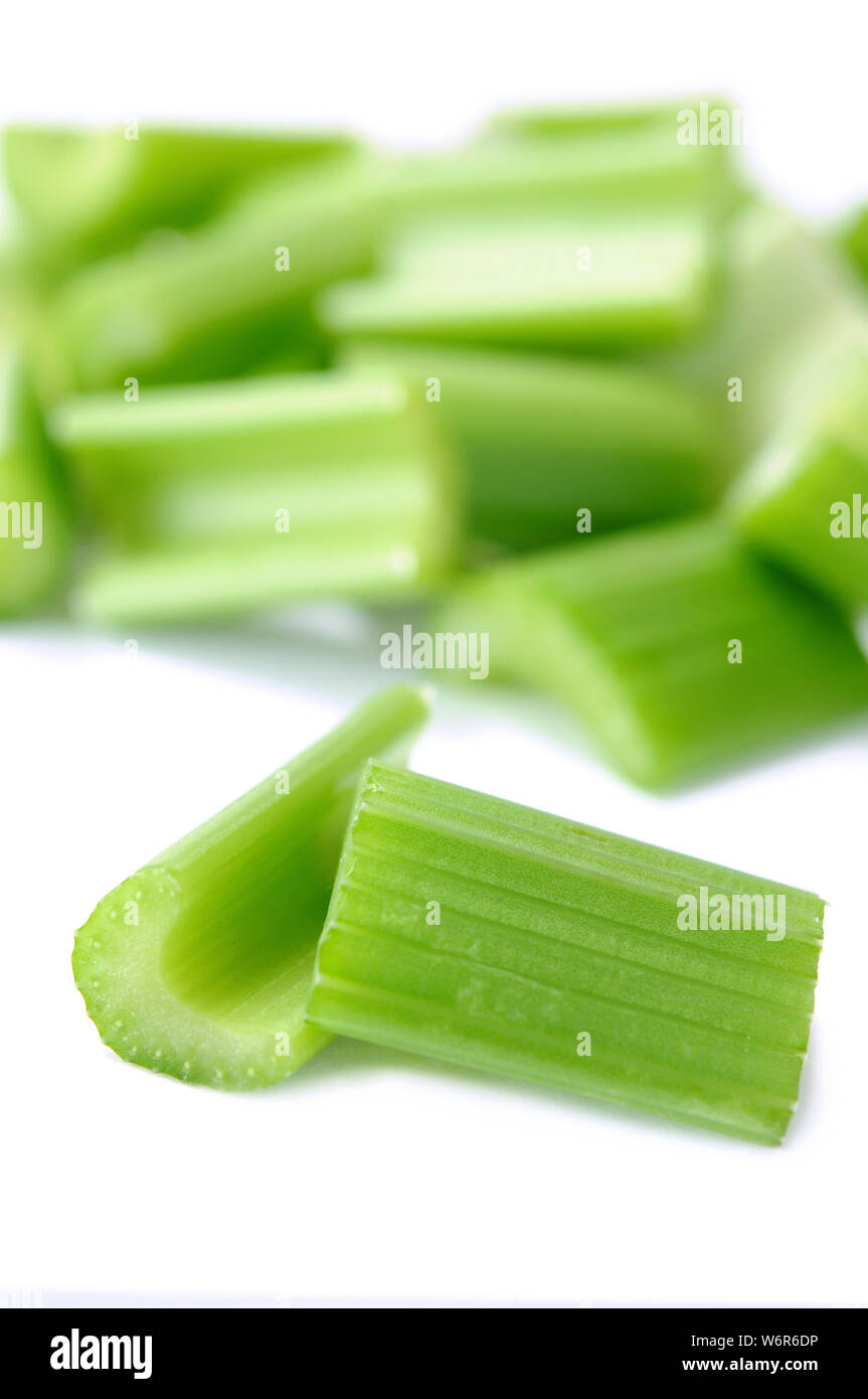 chopped celery isolated on white background Stock Photo - Alamy