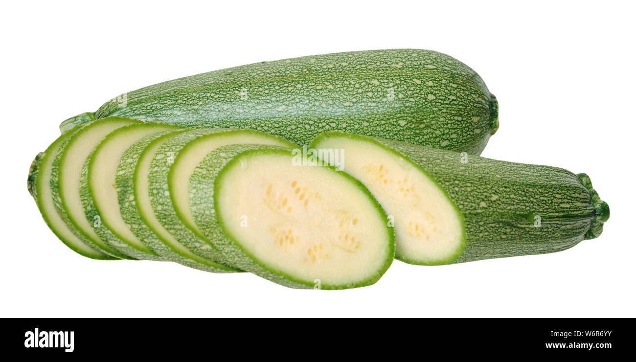 sliced and whole zucchini isolated on white Stock Photo - Alamy