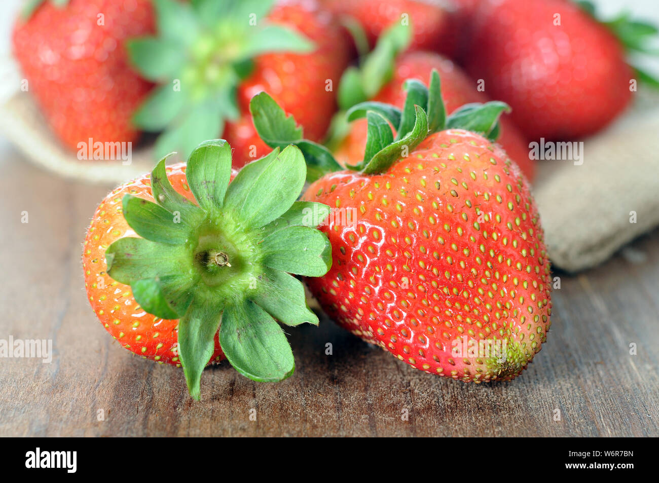group of fresh strawberry on the table Stock Photo - Alamy