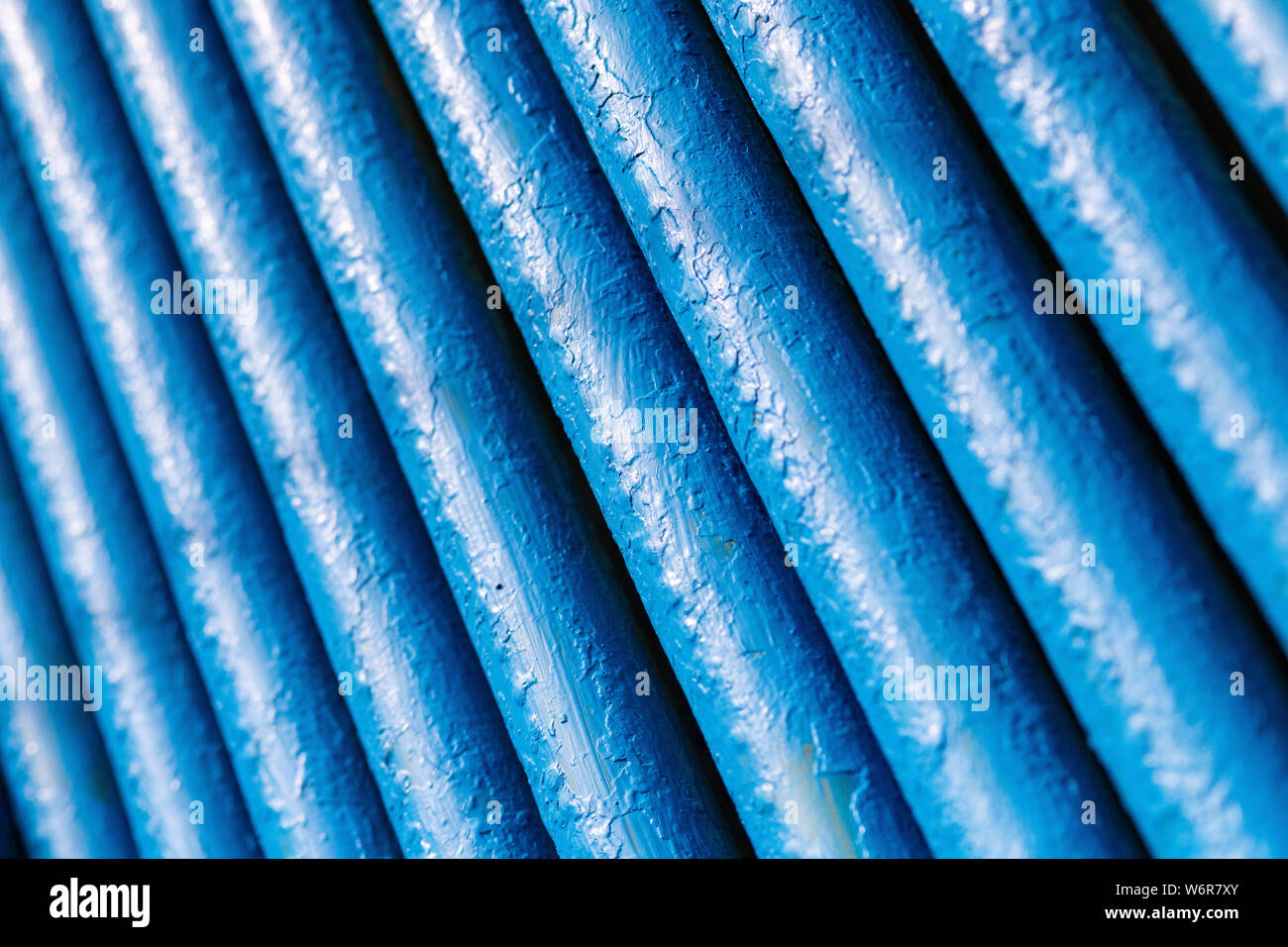 Many old blue pipes. Pipeline used in different industry ways - gas ...