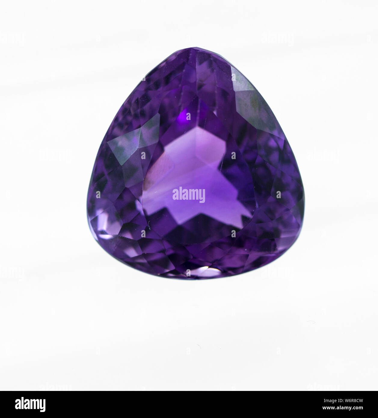 Amethyst Trillion Cut Stone Stock Photo - Alamy
