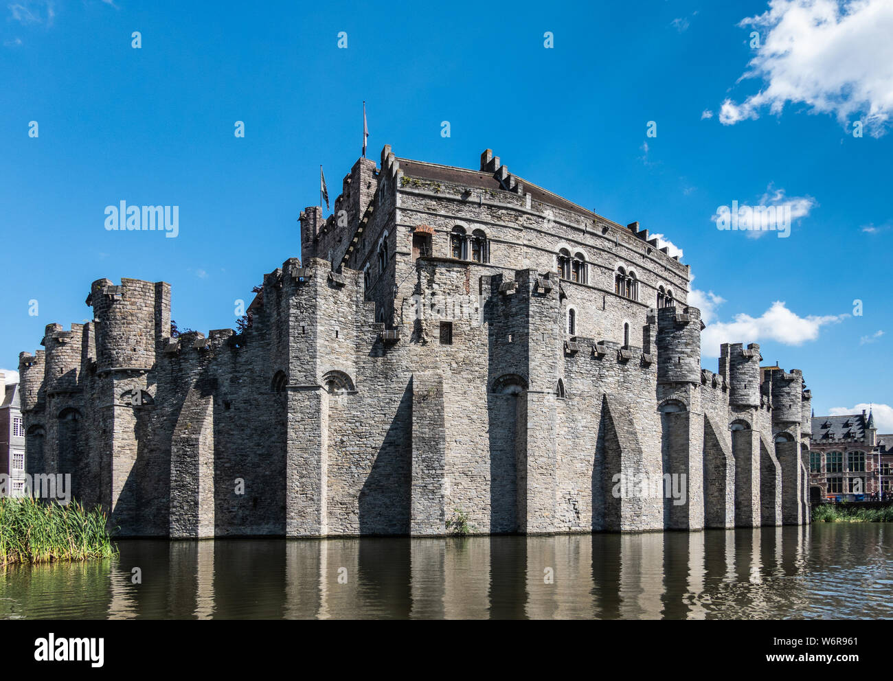 Gent, Flanders, Belgium - June 21, 2019: Gray stone castle and ramparts ...