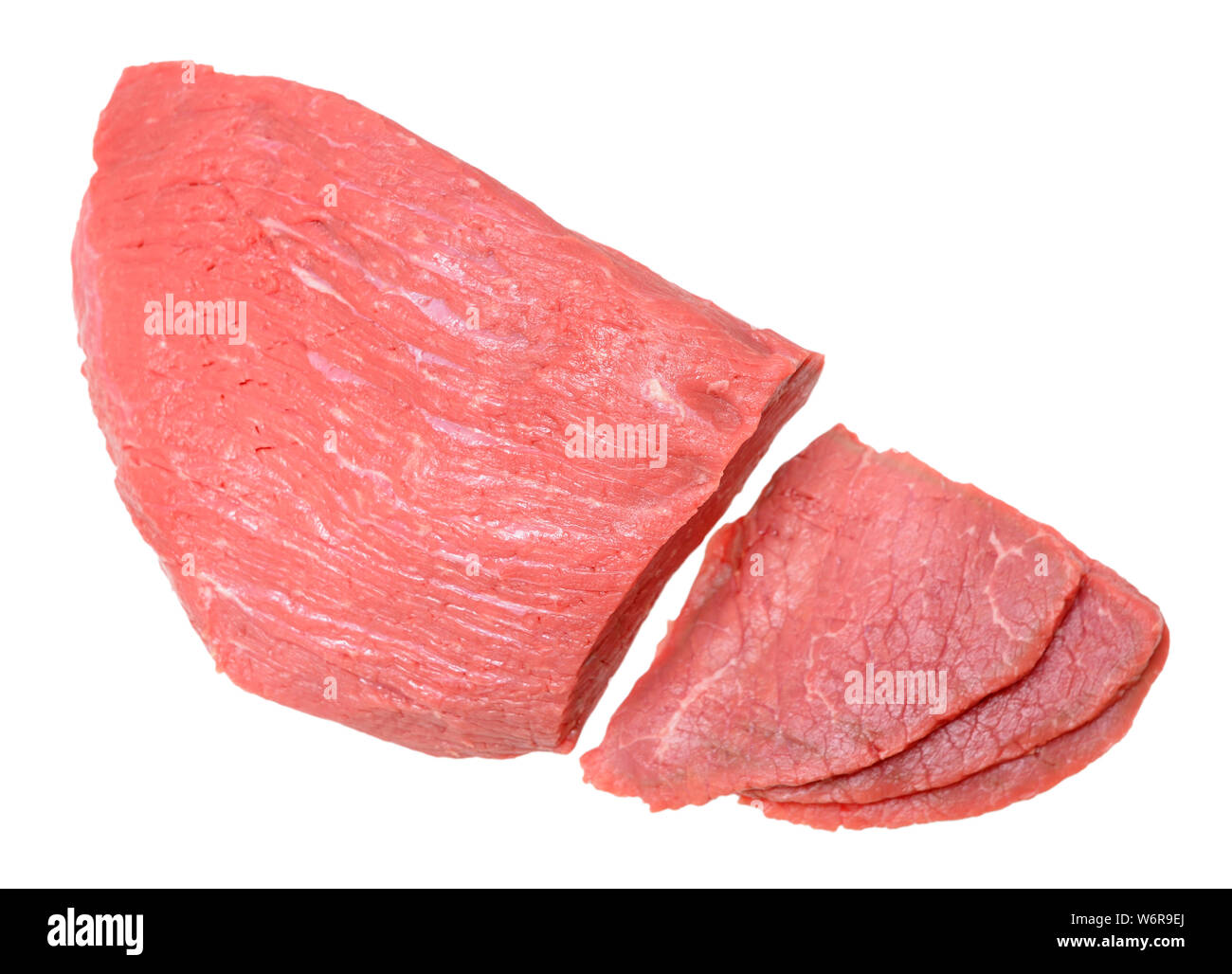 round beef eye meat isolated on white background Stock Photo - Alamy