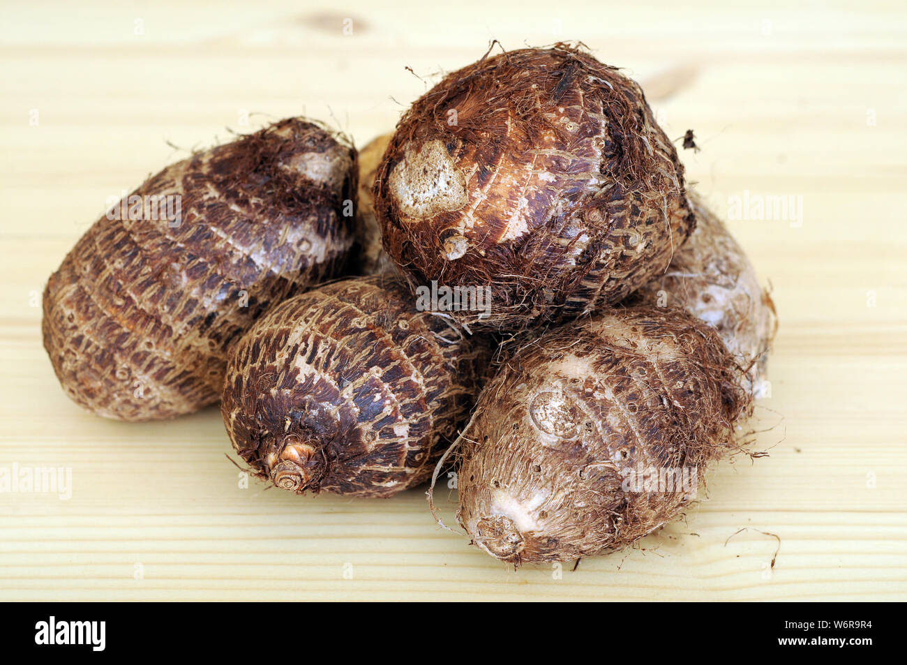 some taro roots display on market place Stock Photo - Alamy