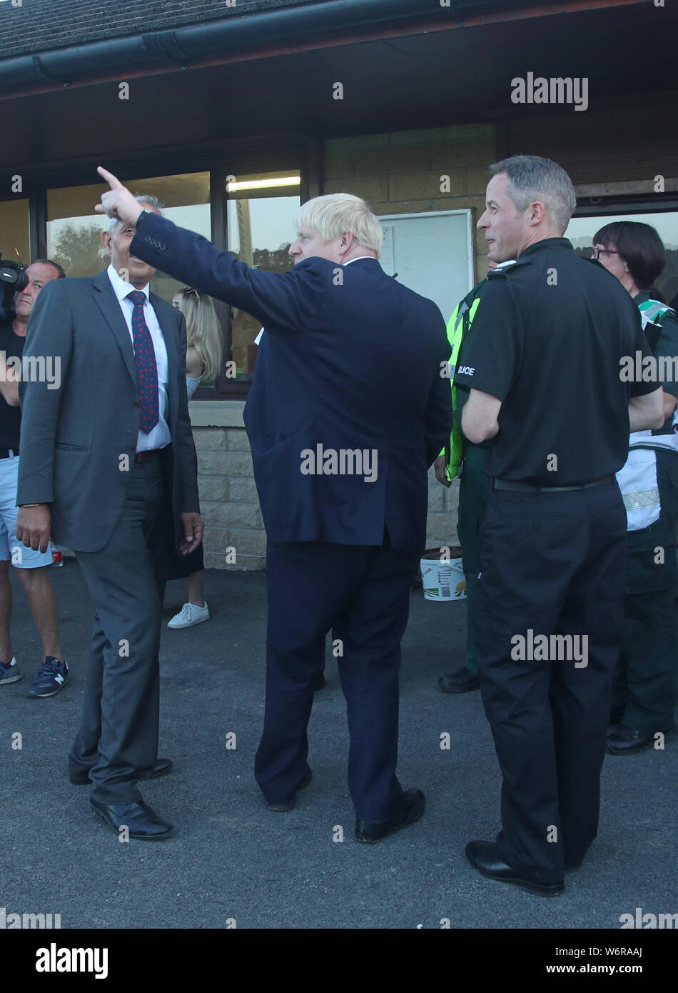 Prime Minister Boris Johnson meeting emergency crews during a visit to ...