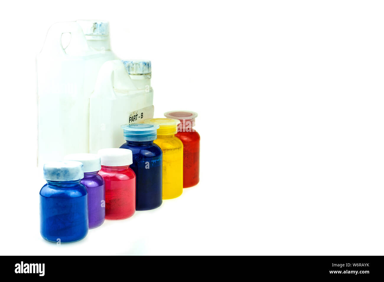Mixing color epoxy resin in plastic cup for casting Stabilizing wood ...