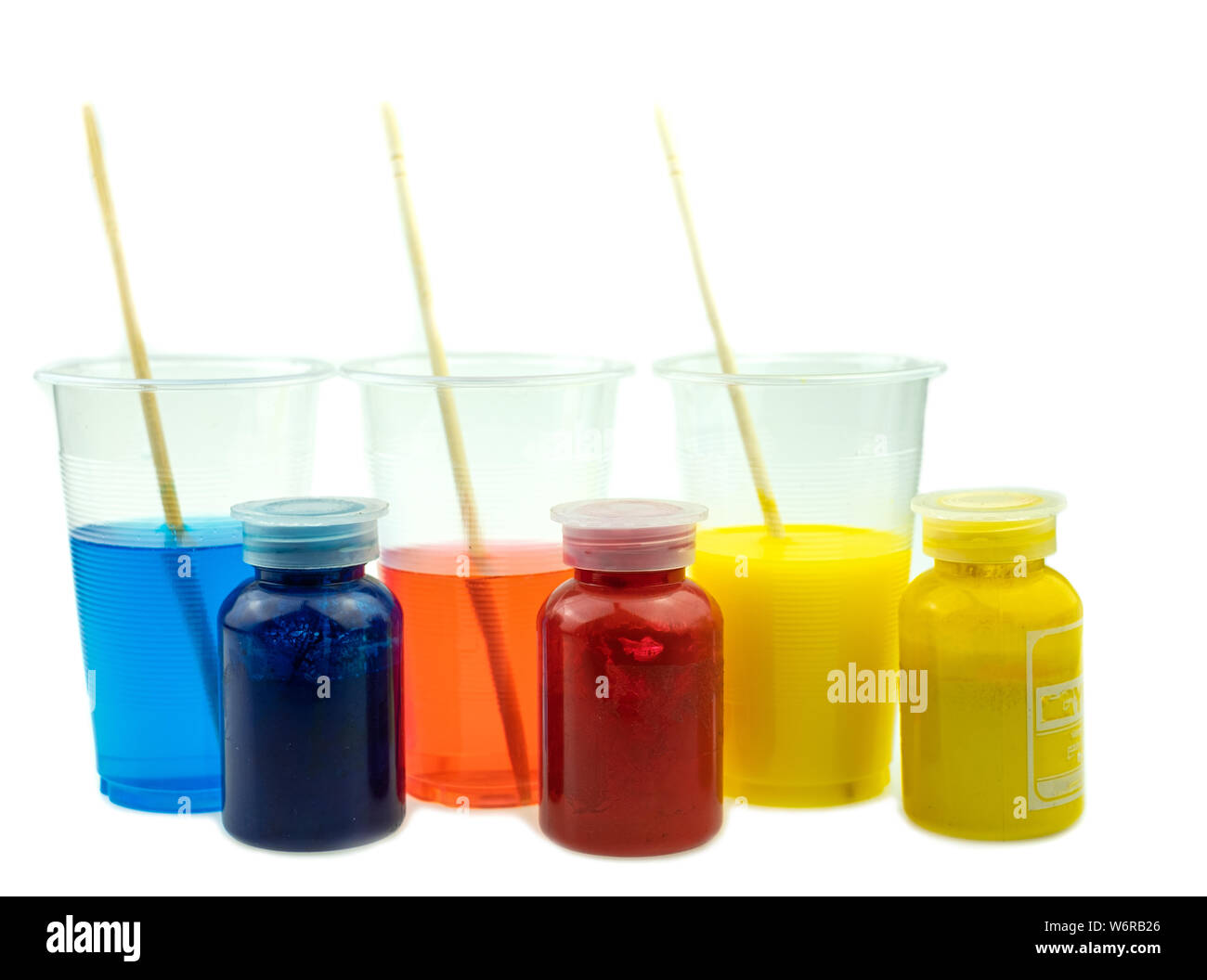 Mixing color epoxy resin in plastic cup for casting Stabilizing wood ...