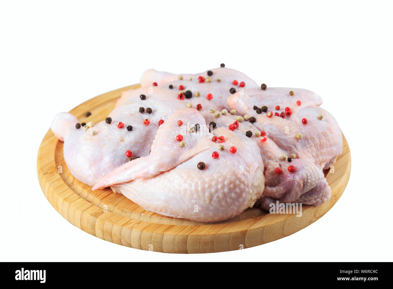 raw chicken carcass on the cutting board isolated on white background ...