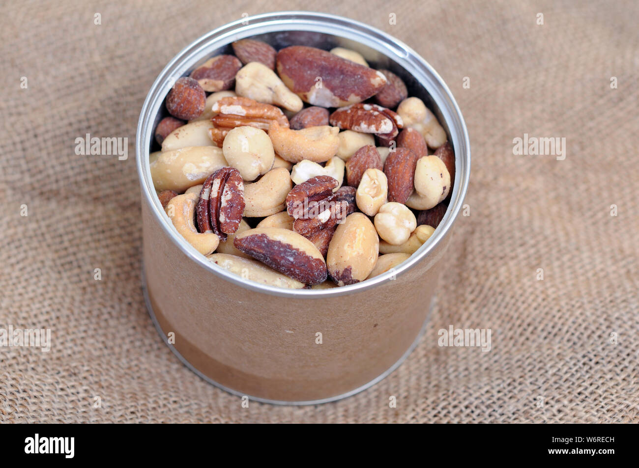 a can of nuts display in market place Stock Photo - Alamy