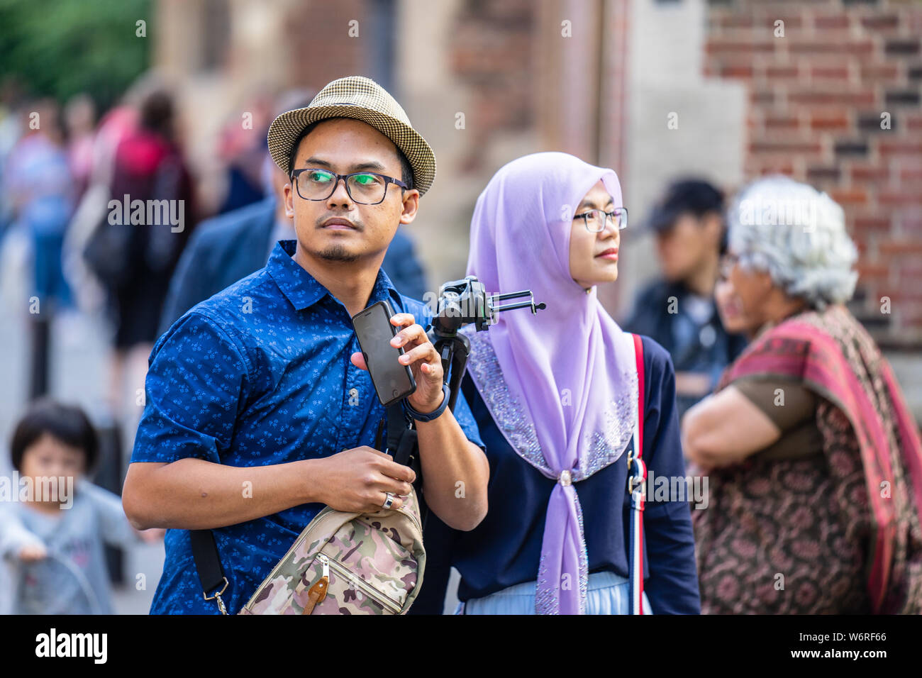 London, UK, August 1, 2019. Attractive couple going out, romantic asian ...