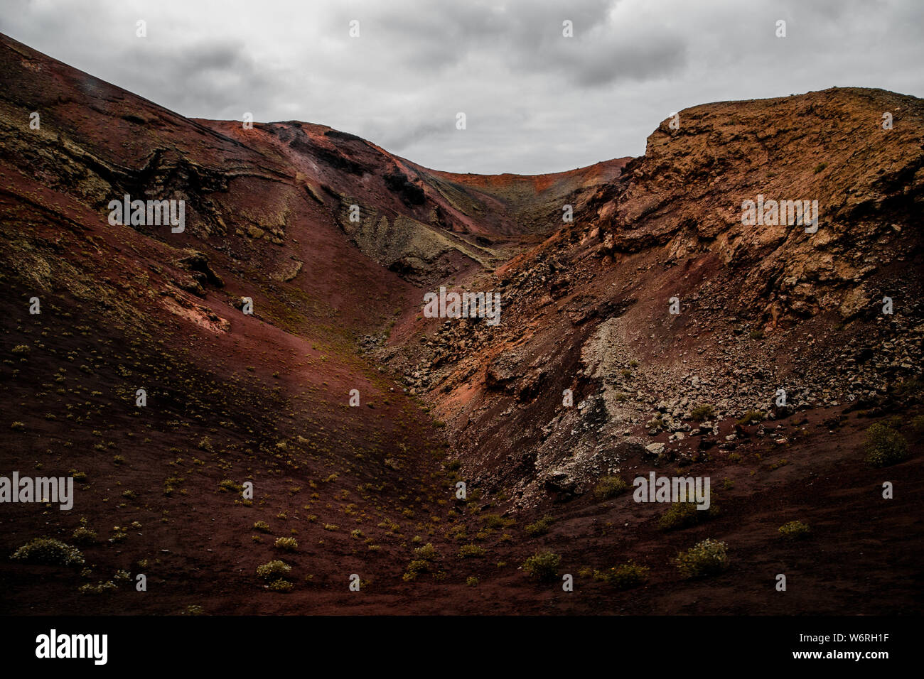incredibly beautiful volcanoc landscape with black sand and red ...