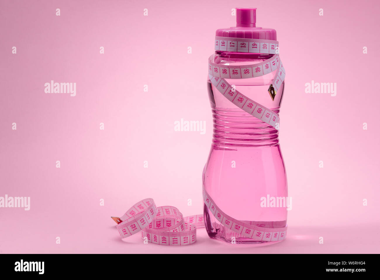 Water bottle and tape measure hi-res stock photography and images - Alamy
