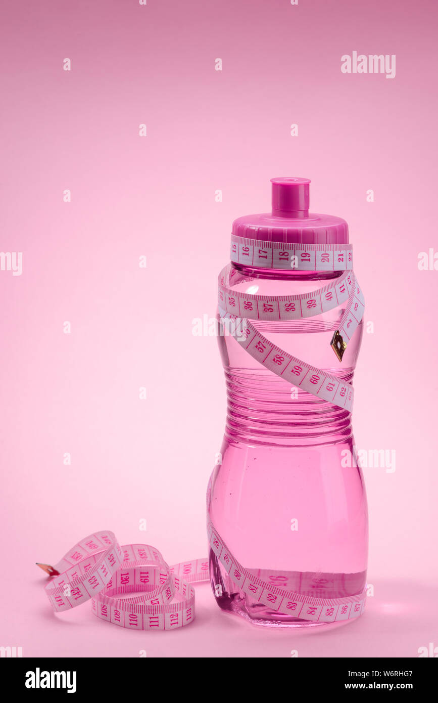 Measure tape and bottle Stock Photo - Alamy