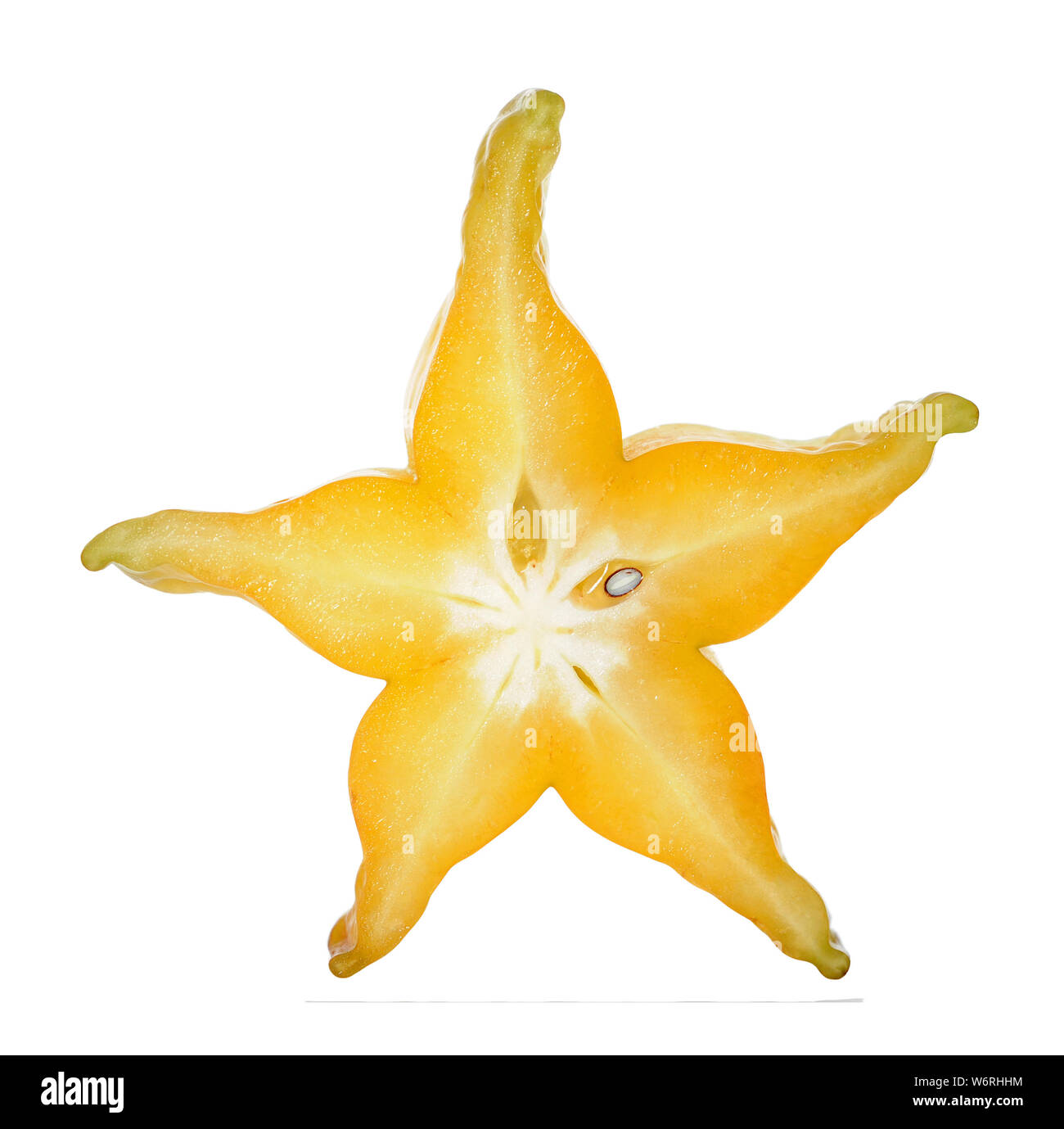 a clice Carambole isolate on white background Stock Photo - Alamy