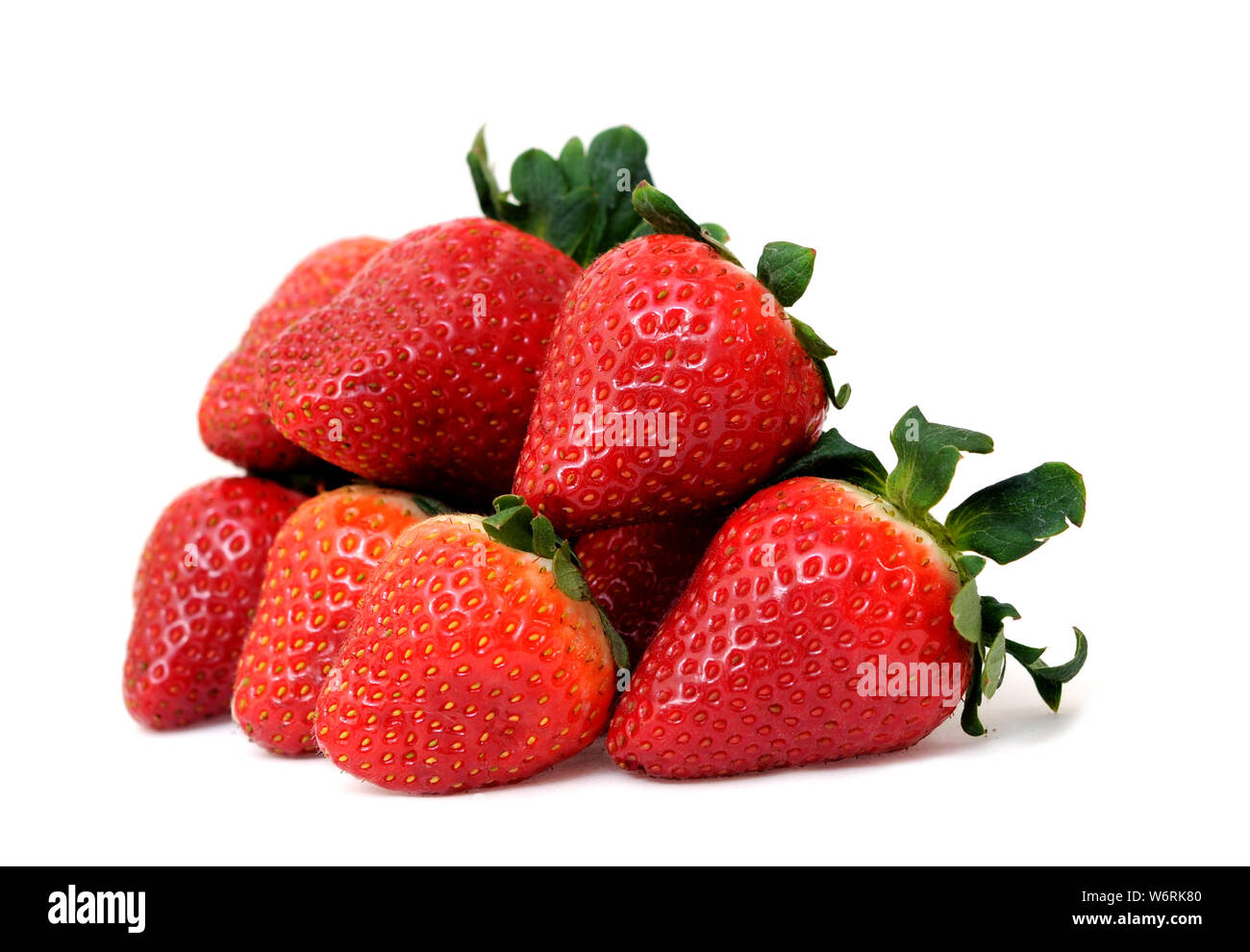 a pile of strawberry on white background Stock Photo - Alamy