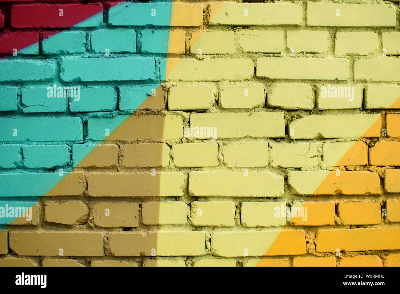 Multi-colored brick surface, painted in different colors. Creative ...