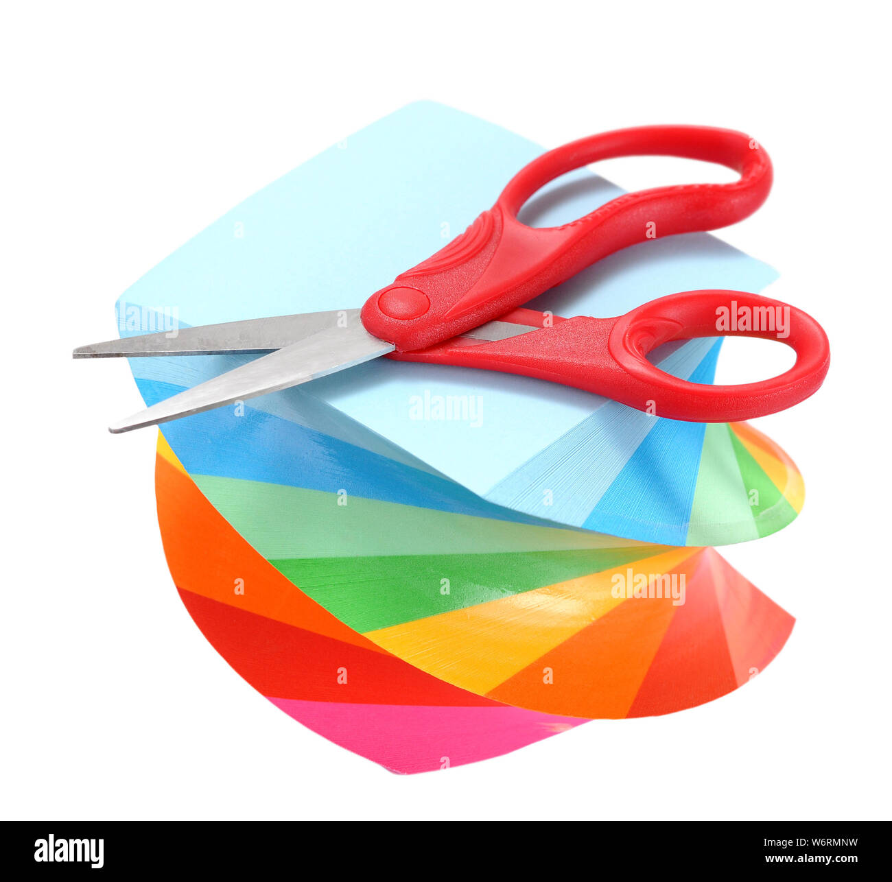 a pile of colorful note paper and scissor isolated on white Stock Photo ...