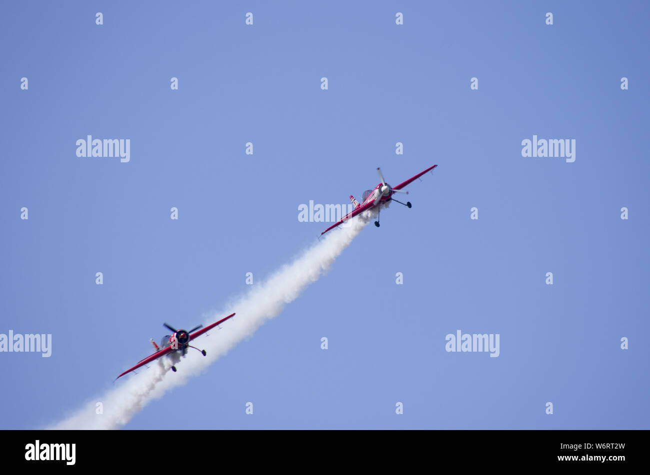 monoplane flight in blue sky Stock Photo - Alamy
