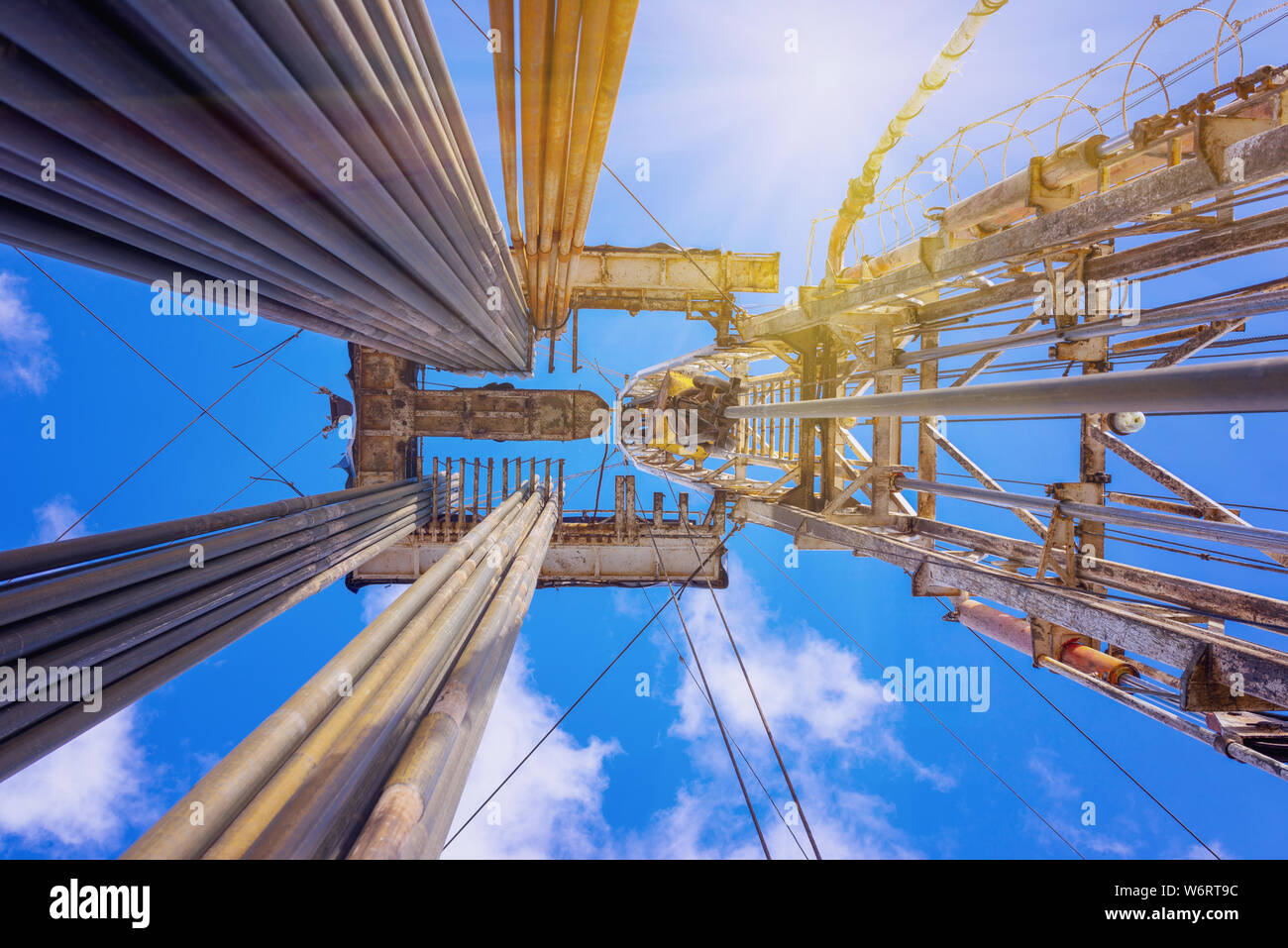 Onshore land rig in oil and gas industry. Oil drilling rig against a ...