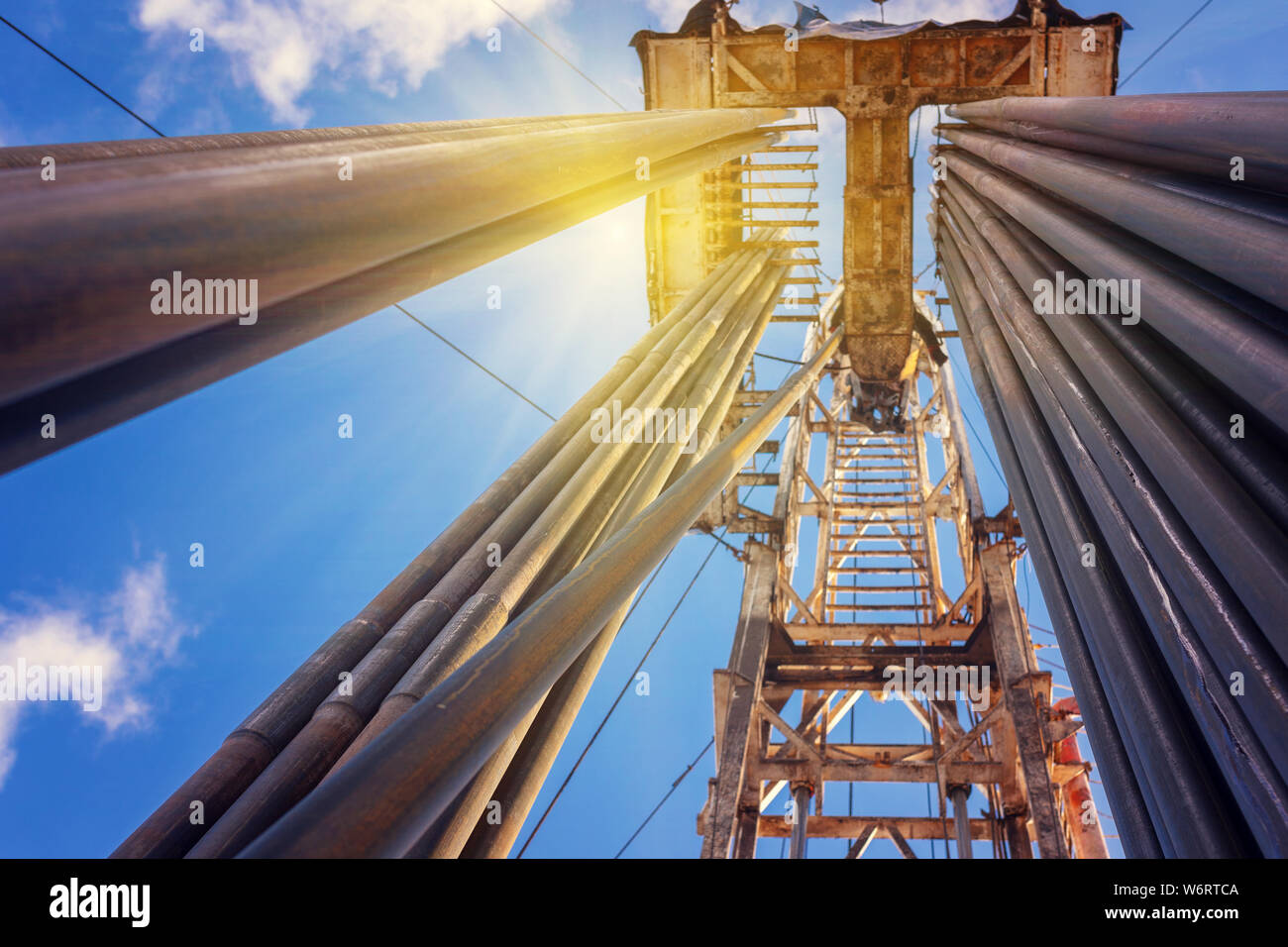 Onshore land rig in oil and gas industry. Oil drilling rig against a ...