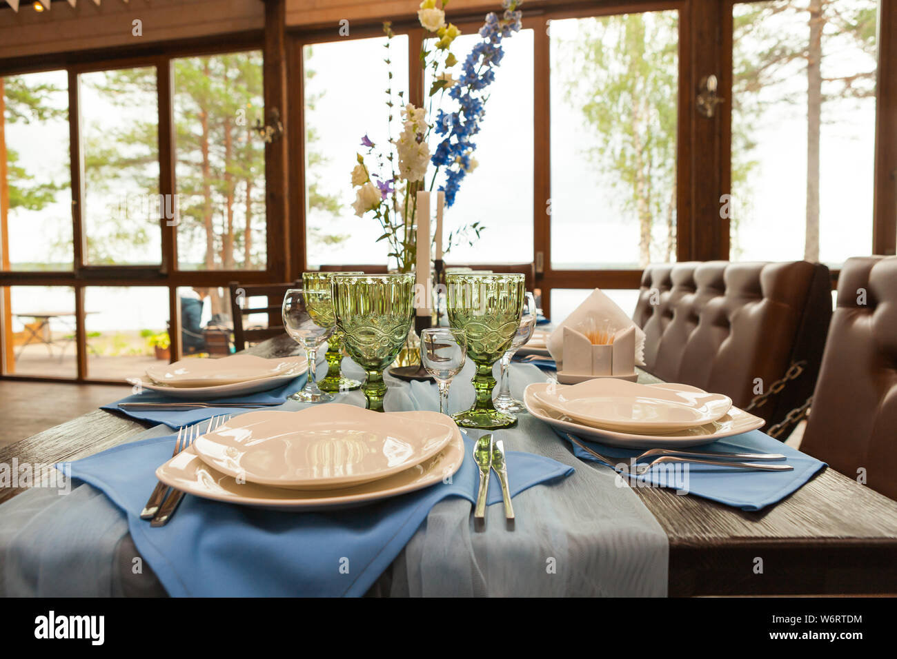 Table set for wedding with flowers, decorations and candles Stock Photo ...