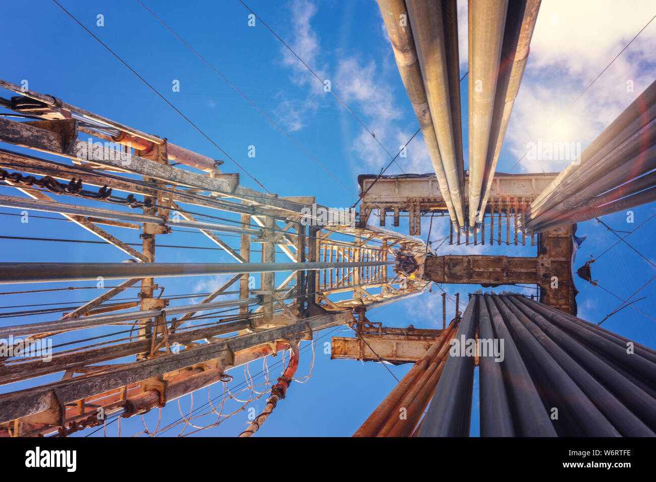 Onshore land rig in oil and gas industry. Oil drilling rig against a ...