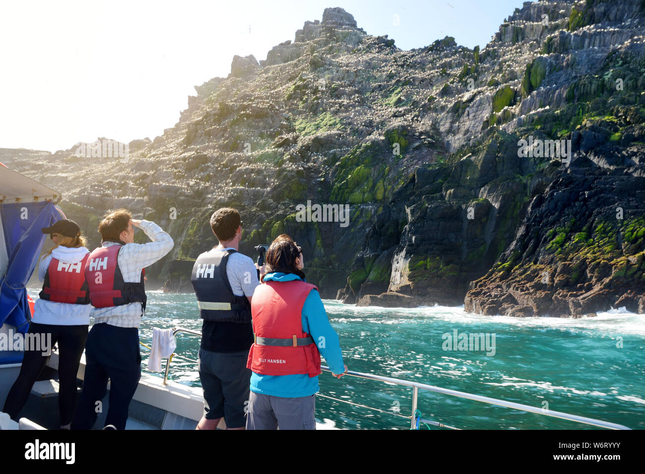 SKELLIG MICHAEL, IRELAND - MAY 22, 2018: Tourists exploring Little ...