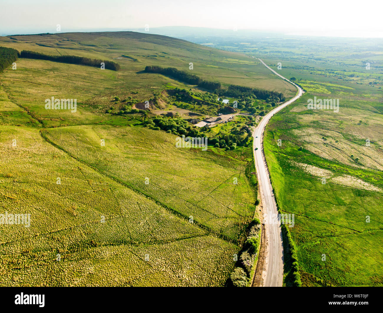 Aerial sunset view of Connemara region in Ireland. Scenic Irish ...