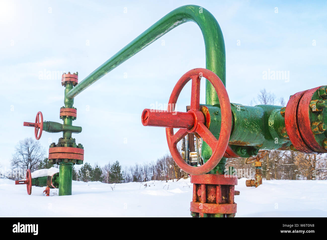 Horizontal view of a wellhead with valve armature. Oil and gas industry ...