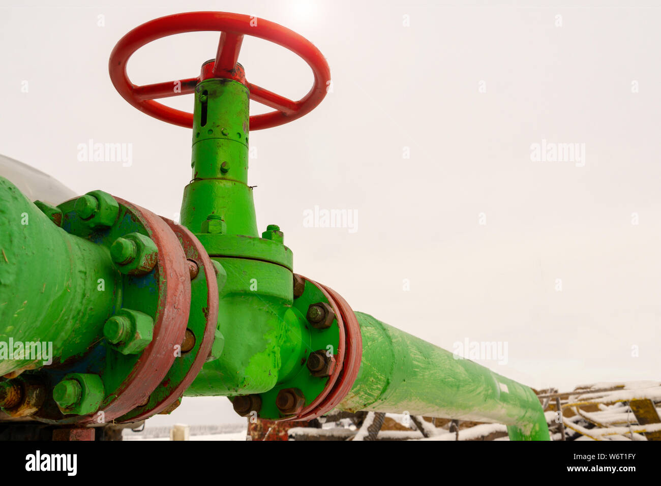 Horizontal view of a wellhead with valve armature. Oil and gas industry ...