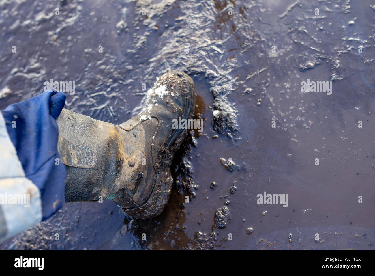 Walking boots mud puddle hi-res stock photography and images - Alamy