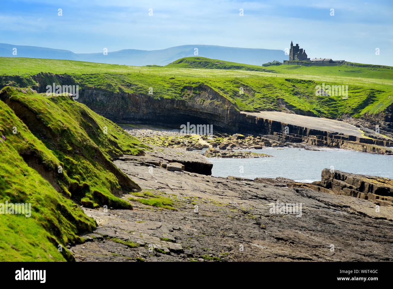 Spectacular view of Mullaghmore Head with huge waves rolling ashore ...
