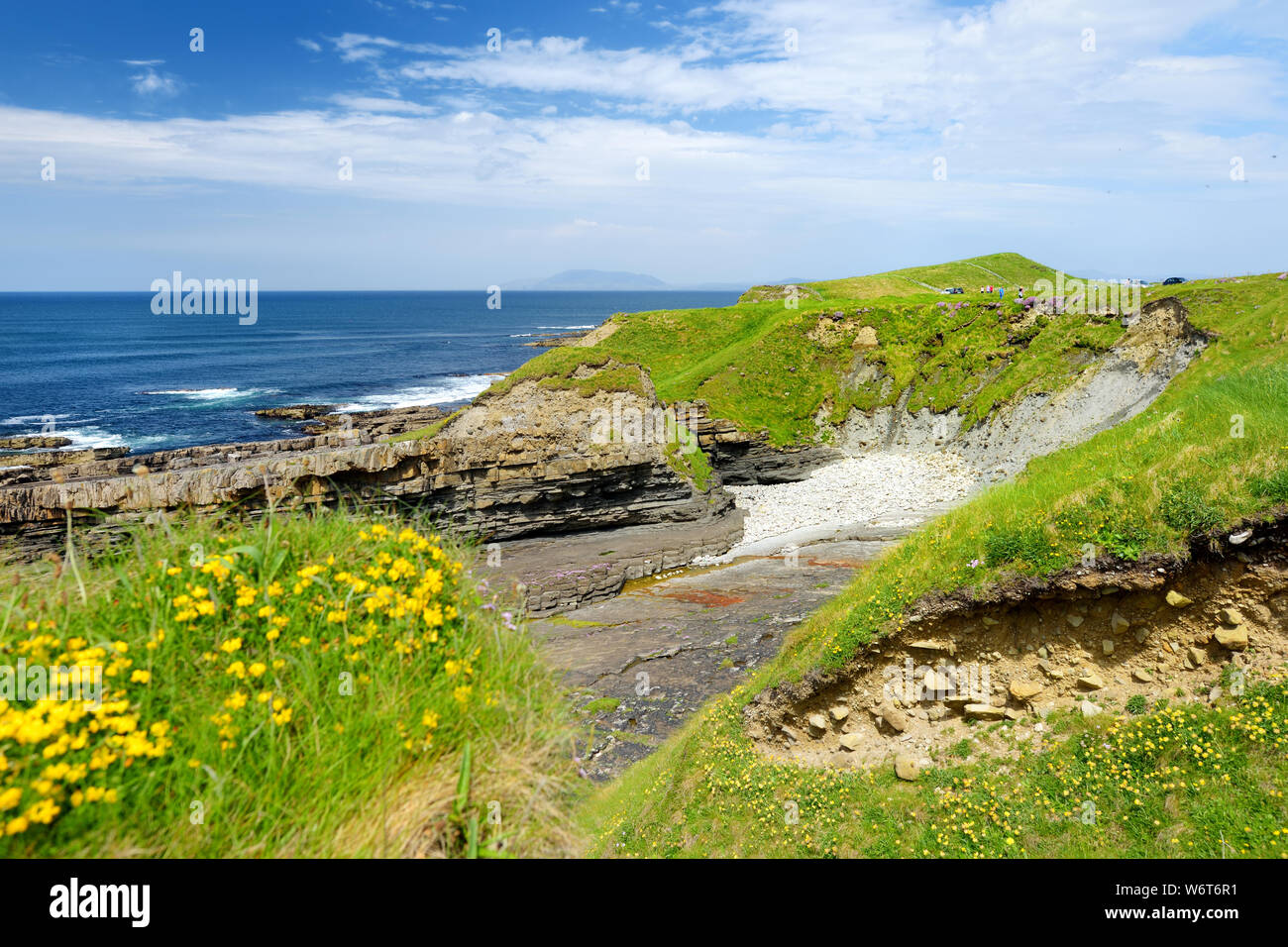 Spectacular view of Mullaghmore Head with huge waves rolling ashore ...