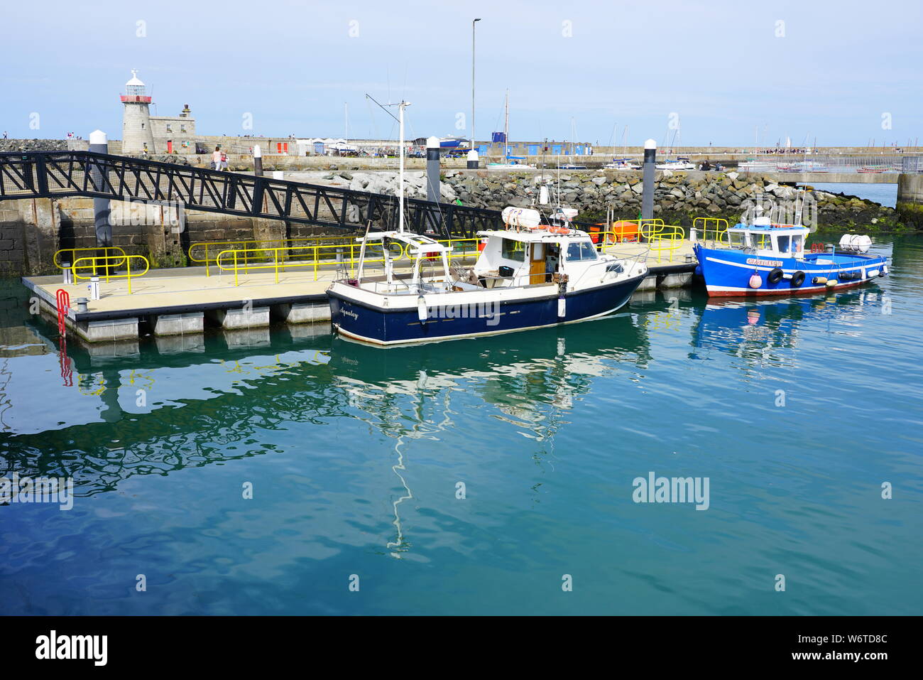 HOWTH, IRELAND- 27 JUL 2019- Fishing boats in Howth, a fishing village ...
