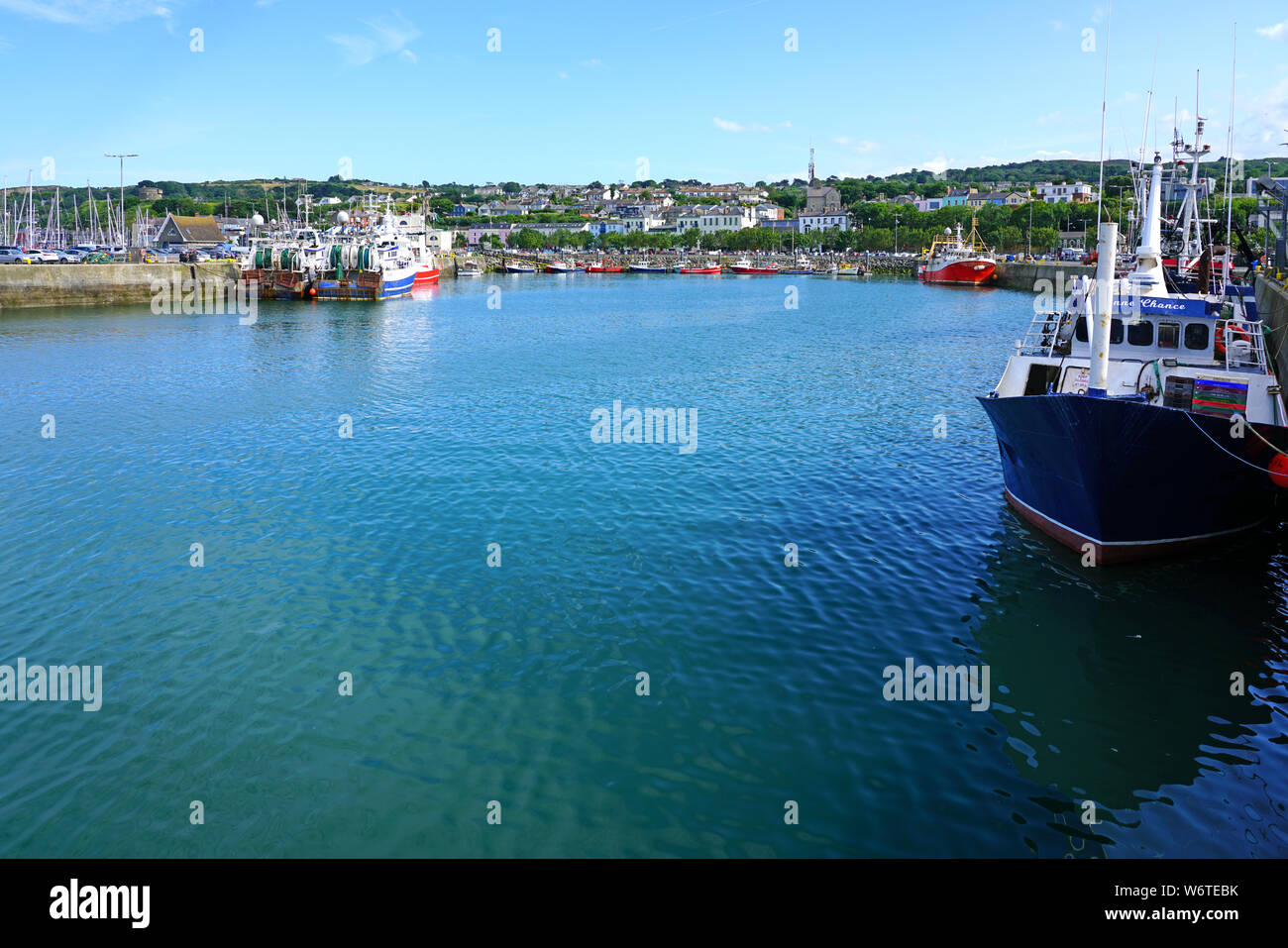 HOWTH, IRELAND- 27 JUL 2019- Fishing boats in Howth, a fishing village ...