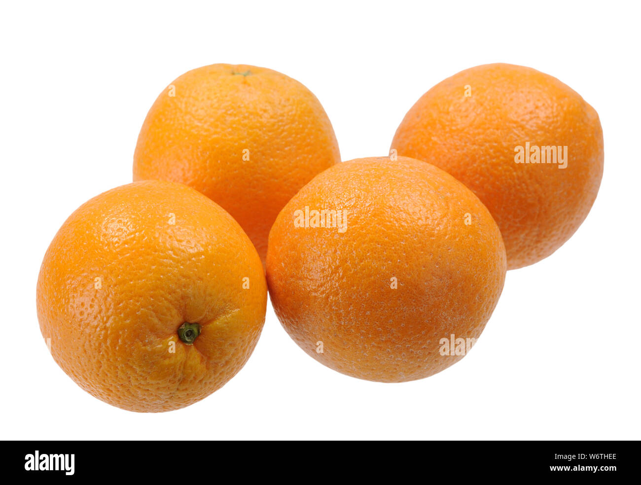four orange fruit isolate on white background Stock Photo - Alamy