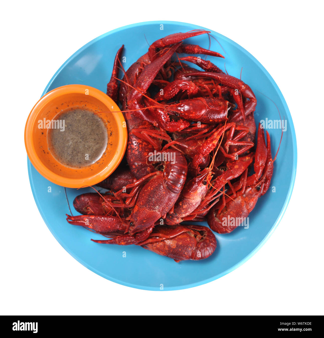steamed crawfish on dish served with lime juice, salt and pepper ...