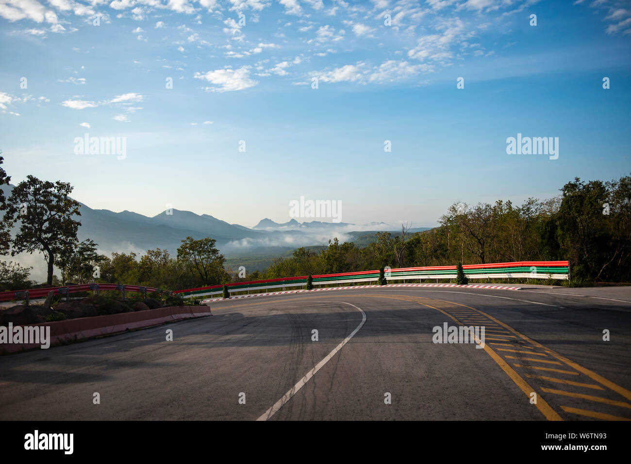 curve road driving a car on mountain road downhill / Dramatic curve ...