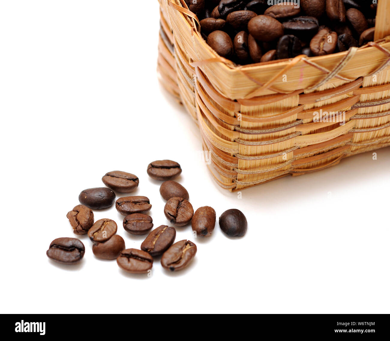 coffee beans and bammbo bucket on white Stock Photo - Alamy