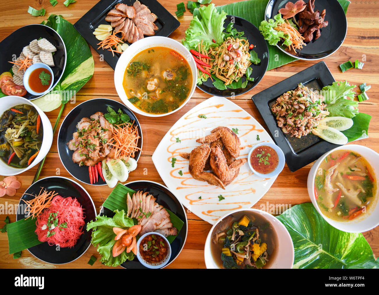Thai food served on dining table / Tradition northeast food Isaan ...