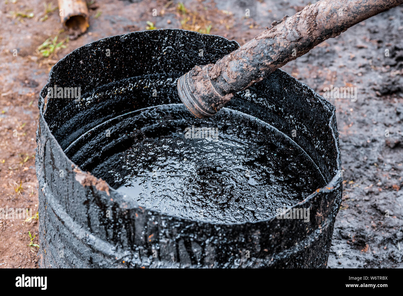 crude oil surface background textured. Pollution with oil products ...