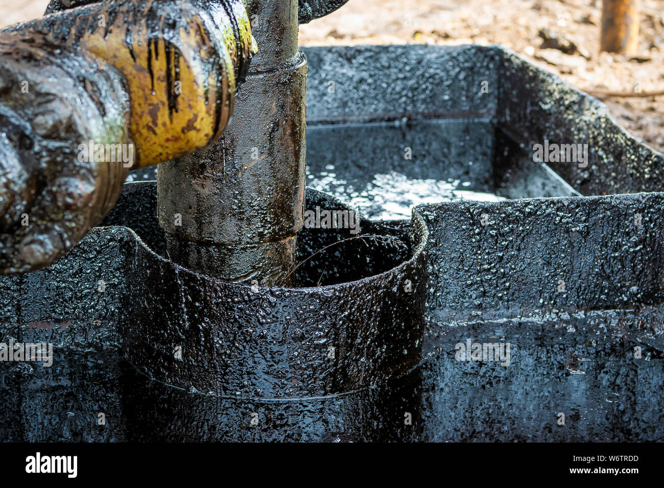 crude oil surface background textured. Pollution with oil products ...